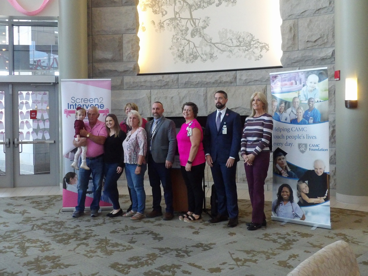 Portion of world's longest pink scarf honoring Breast Cancer Awareness ...