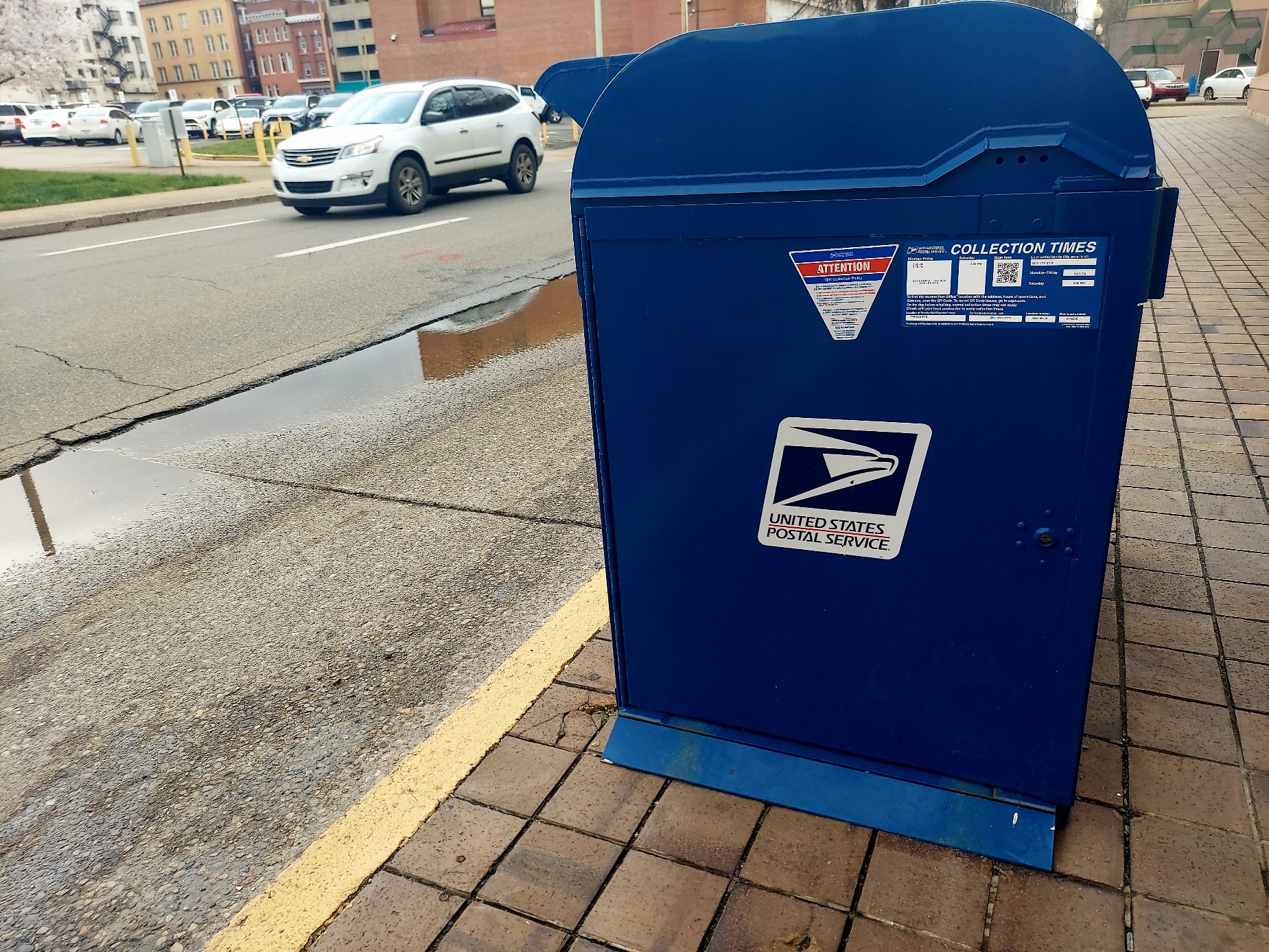 Local postal union workers rally together in opposition of potential ...