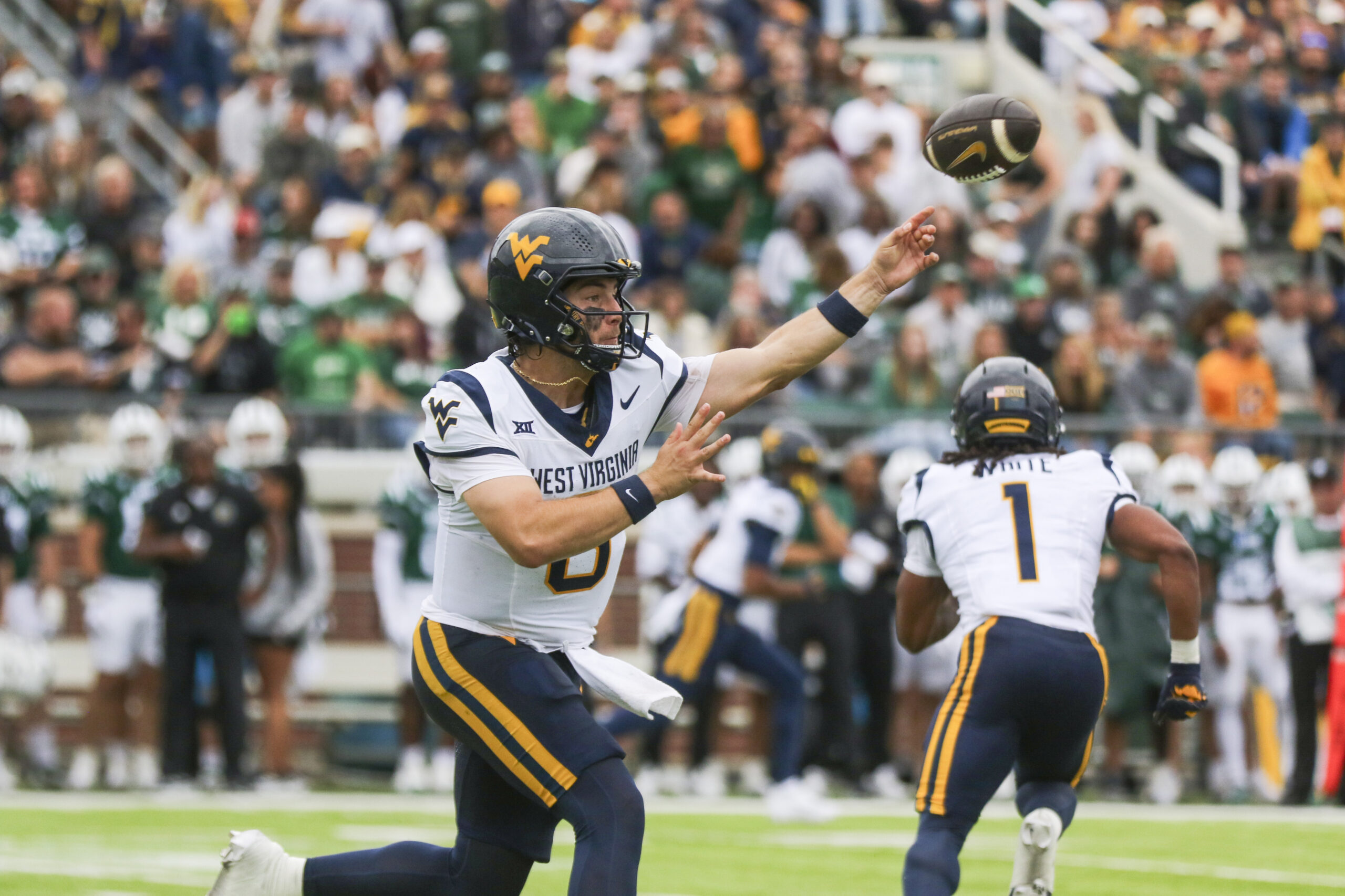 Evaluation of quarterbacks continues for Rodriguez, who vows to 'give ...