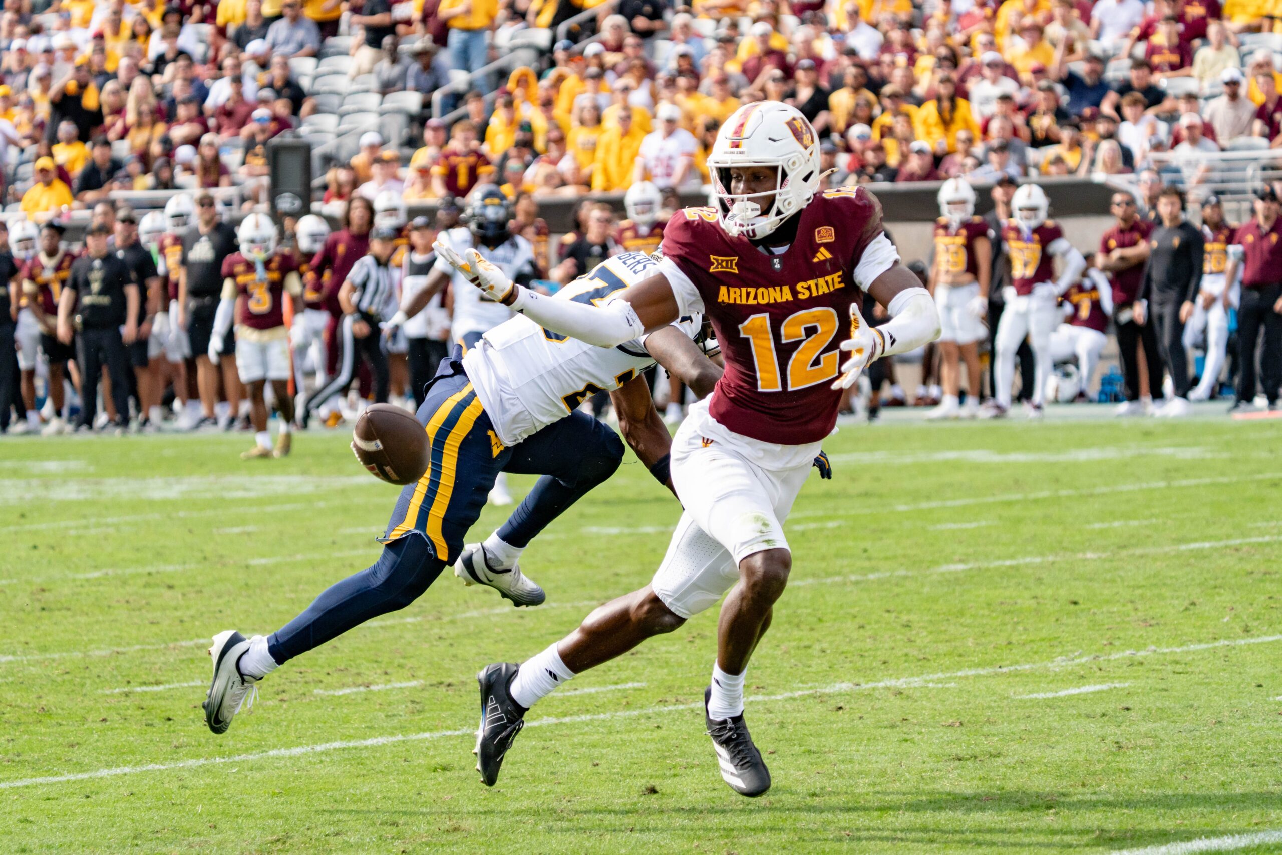 West Virginia locked into losing season with 25-23 setback to Sun ...