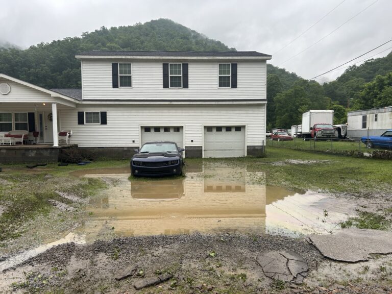 Flooding along Pond Fork leaves long trail of mud and damage along ...